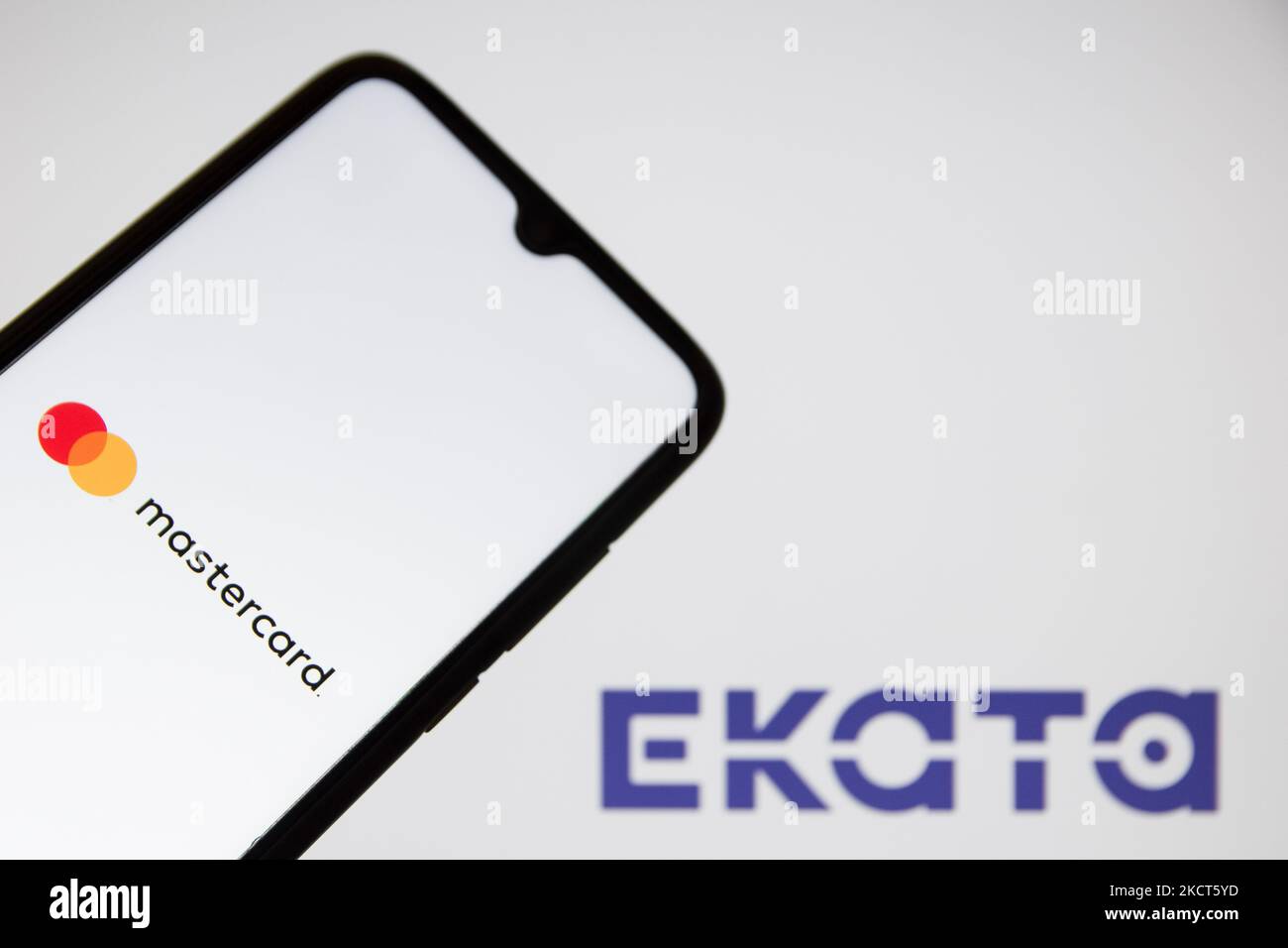 In this photo illustration MasterCard logo is displayed on smartphone ...