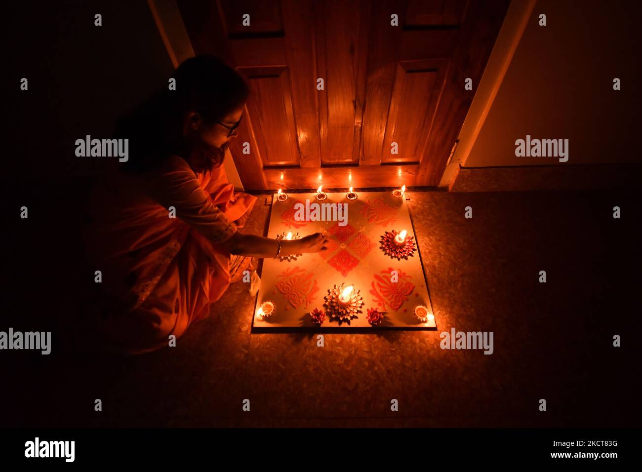 Women make a rangoli on the occasion of Diwali in Nagaon District of ...