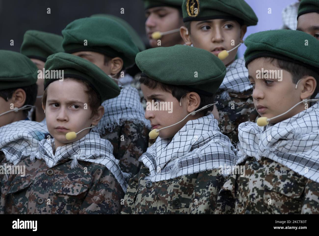 A group of Iranian schoolboys wearing Islamic Revolutionary Guard Corps ...