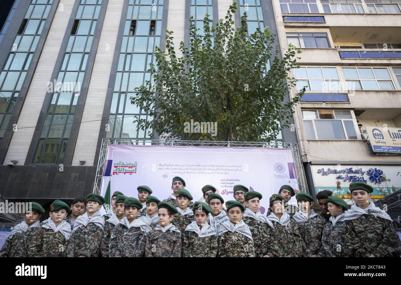 A group of Iranian schoolboys wearing Islamic Revolutionary Guard Corps ...