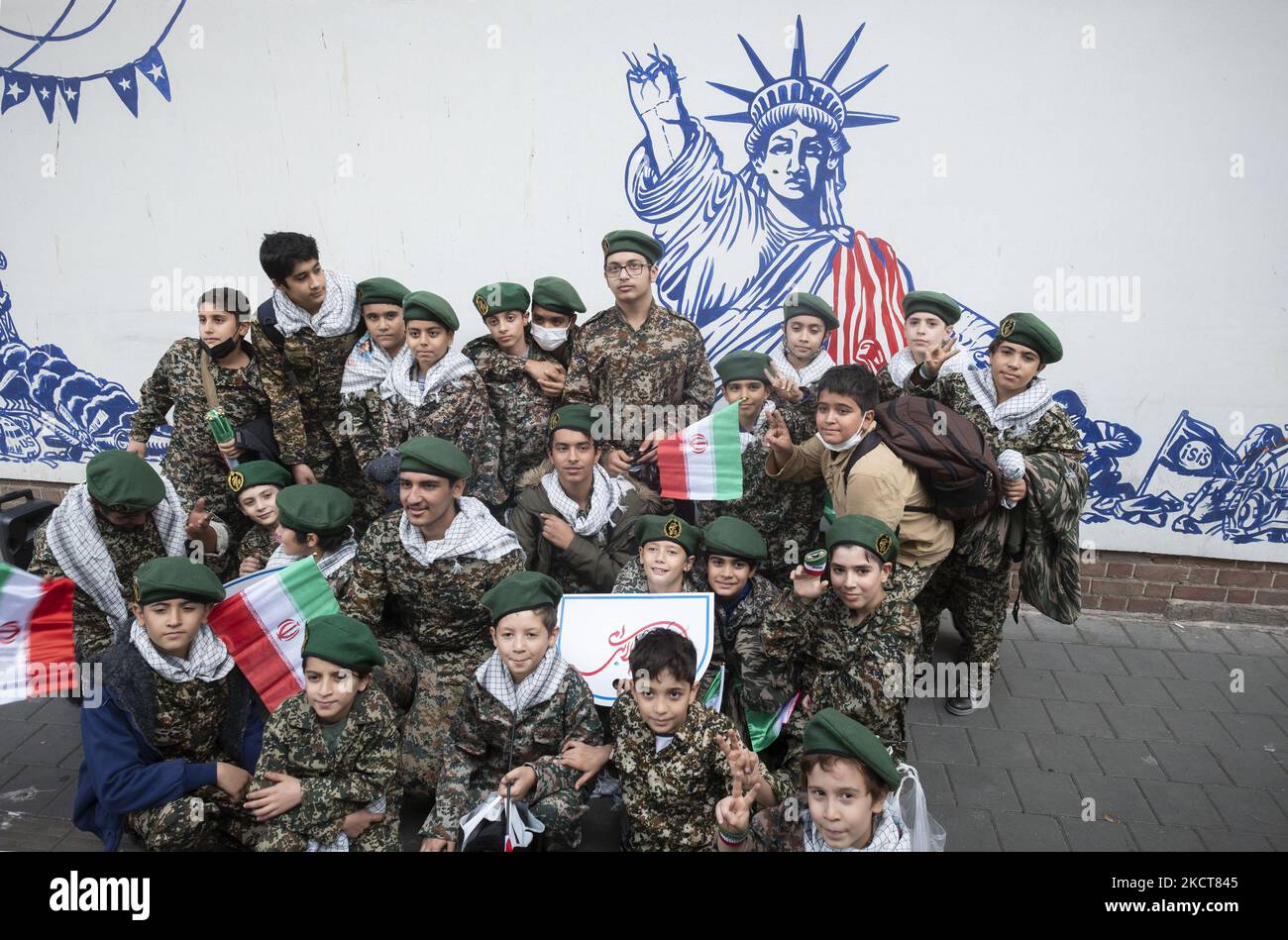 A group of Iranian schoolboys wearing Islamic Revolutionary Guard Corps ...