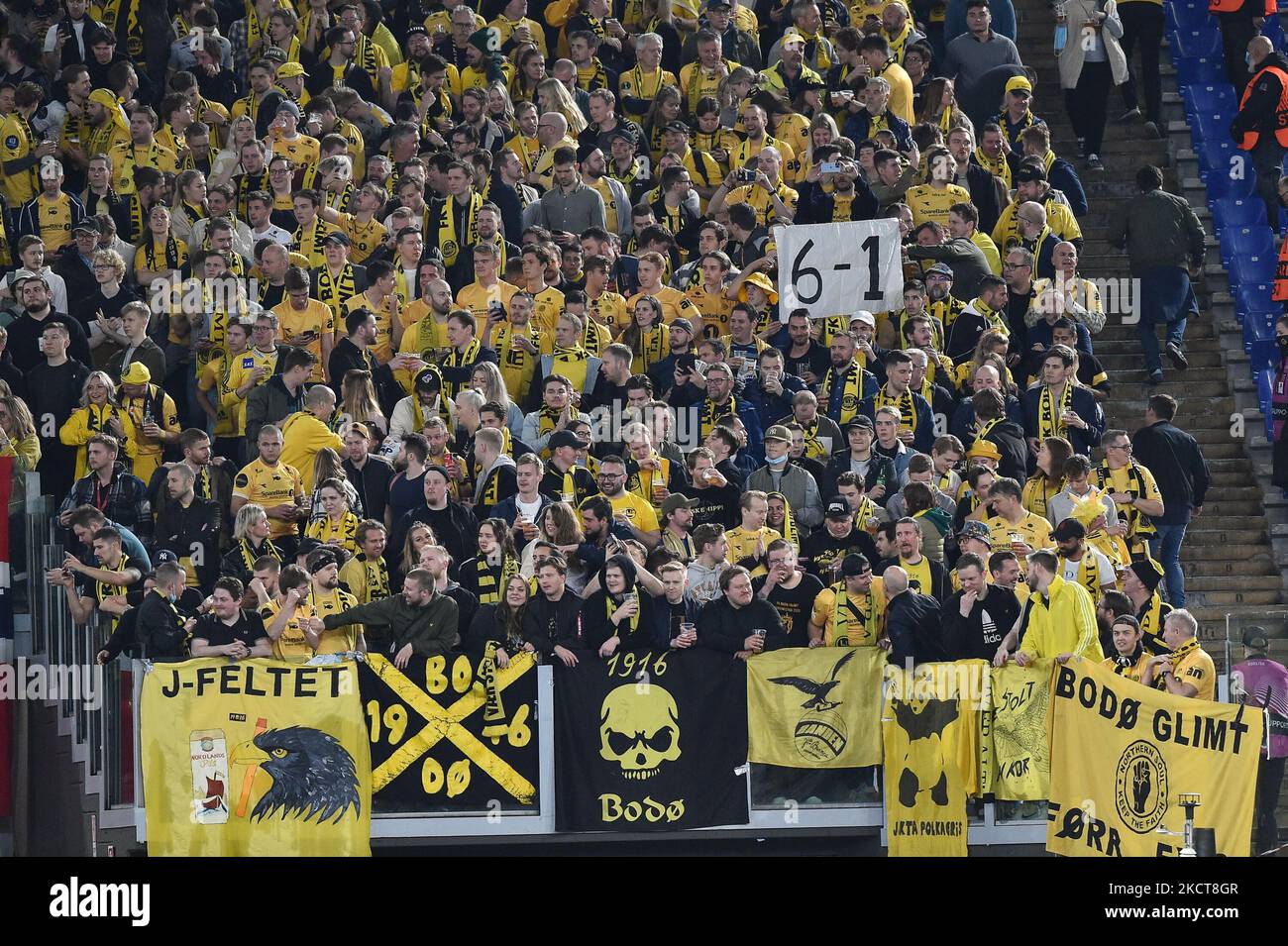 Supporters of Bodo/Glimt show a banner with the result of home match ...