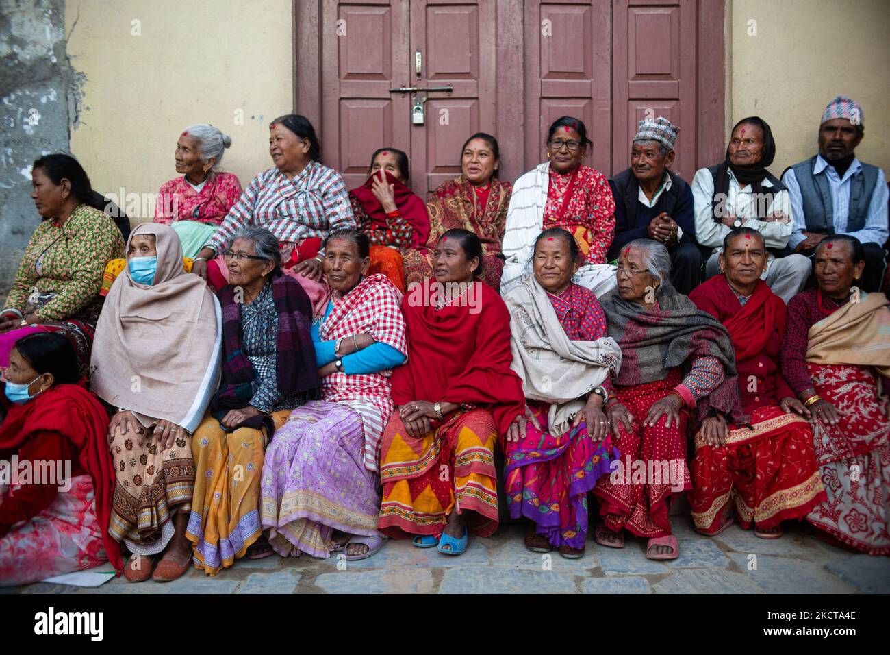 Nepalese people watch the mass Mha: Pooja ceremony at Khokana, Lalitpur ...
