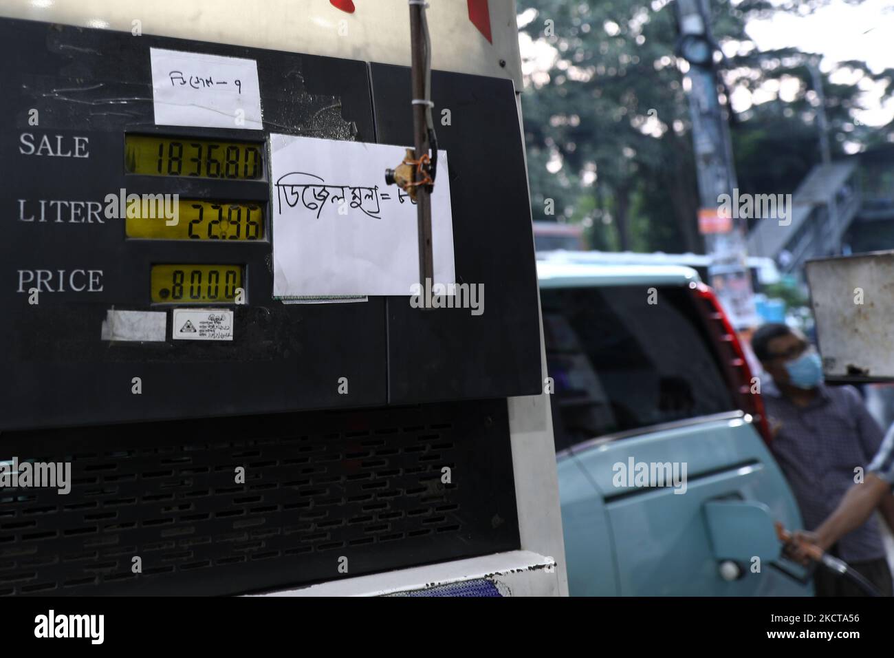 A paper is seen attached in a diesel fuel tank with an increased price ...