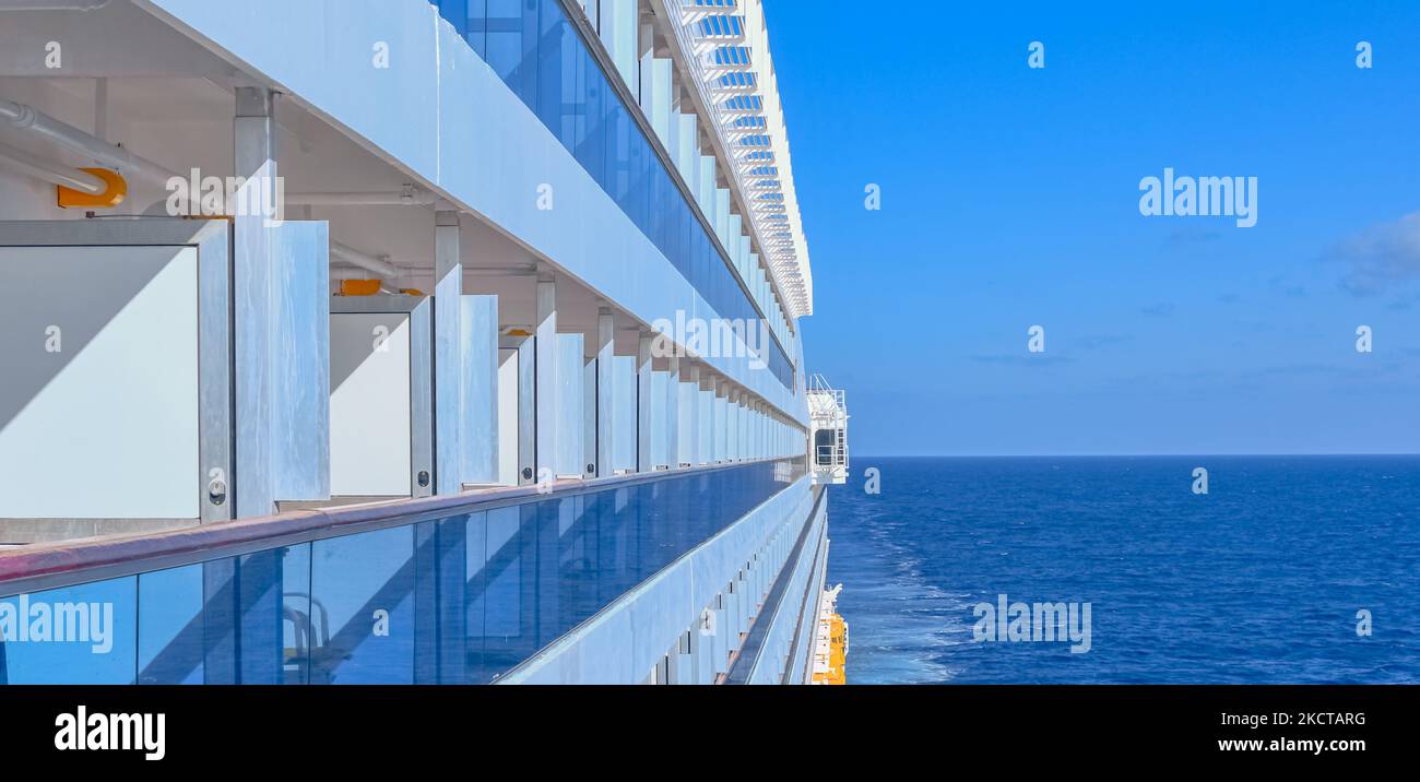 View of a cruise ship and the balcony cabins while sailing on the sea ...