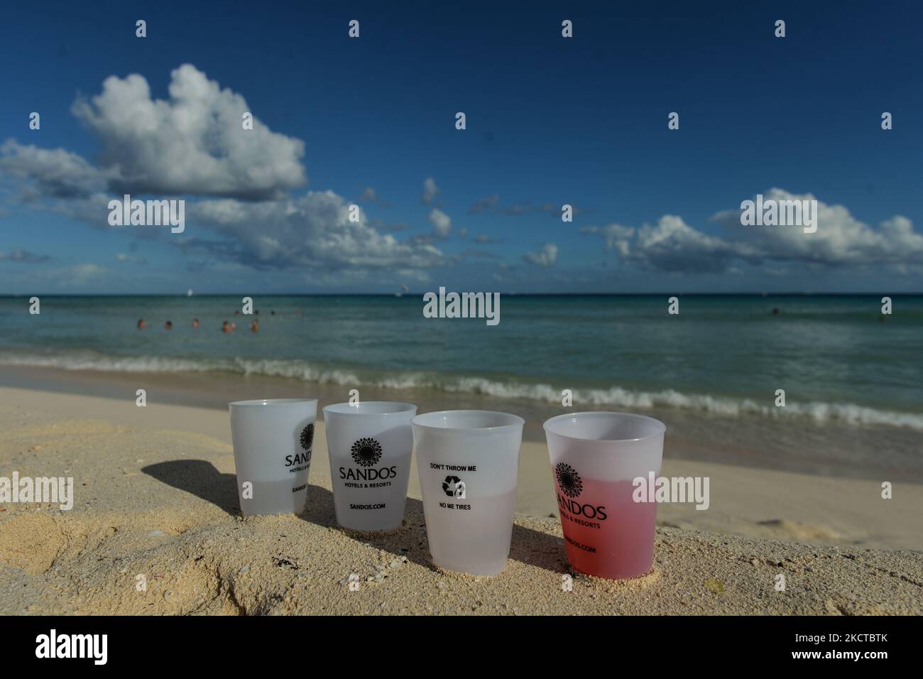 View of drinks left on Playacar Beach, known for its fine sand, clear ...