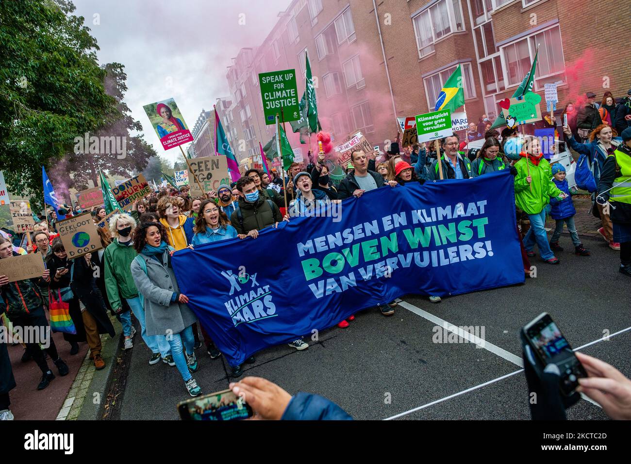 The principal banner is arriving at Westerpark accompanied by black and ...