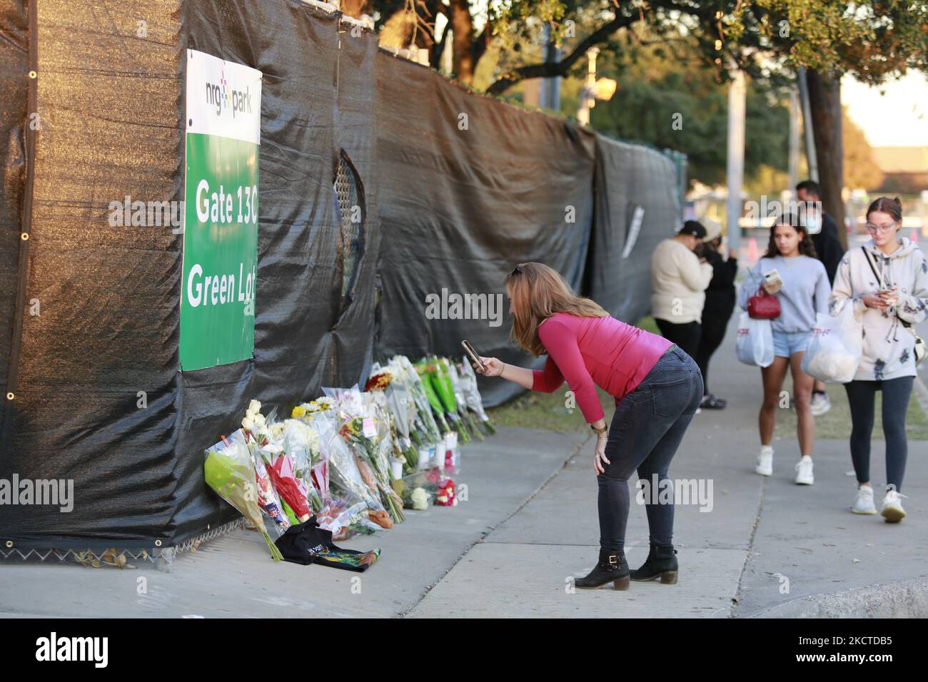 On November 6th, 2021, grieving festival goers left notes, balloons ...