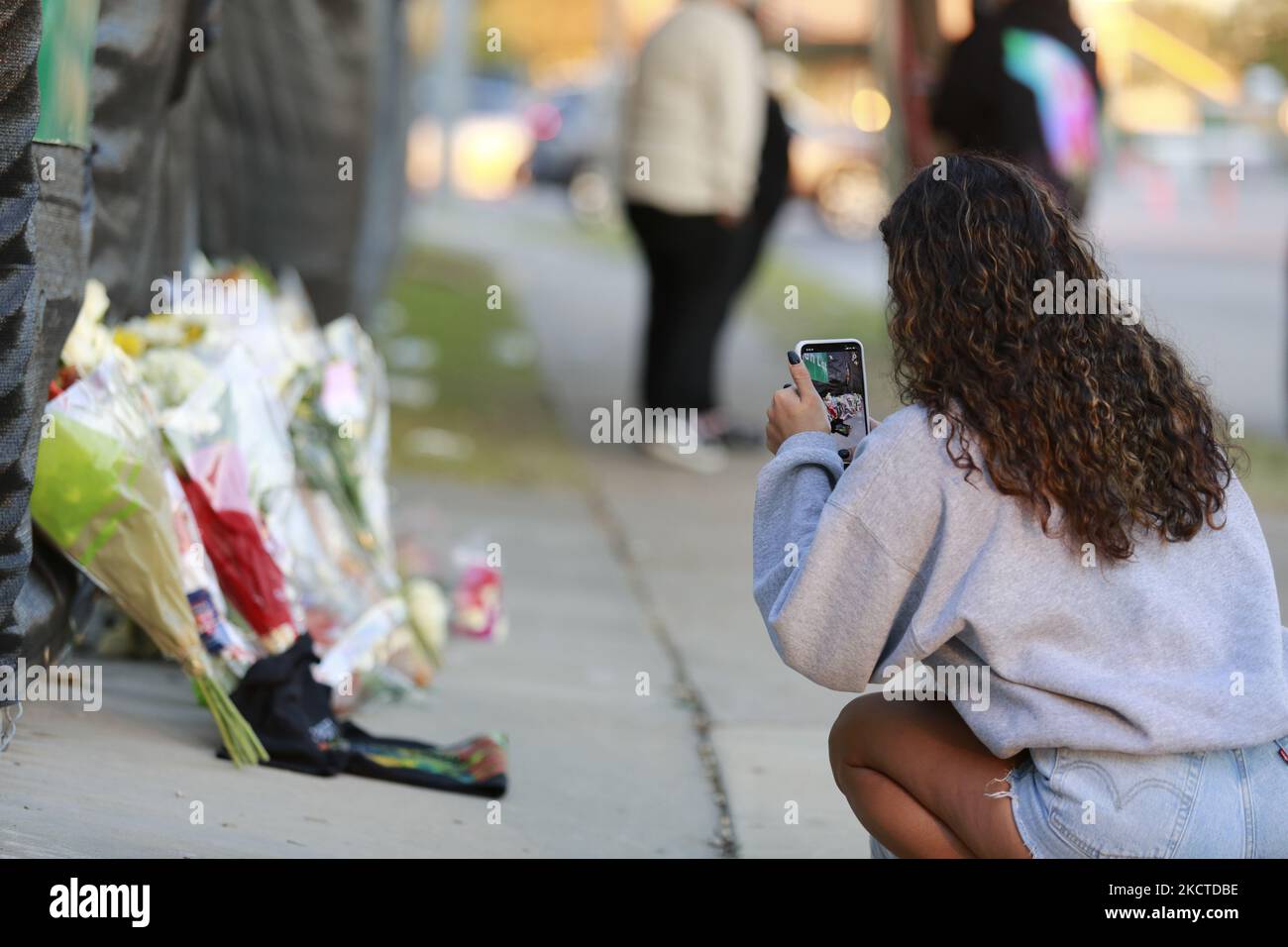 On November 6th, 2021, grieving festival goers left notes, balloons ...