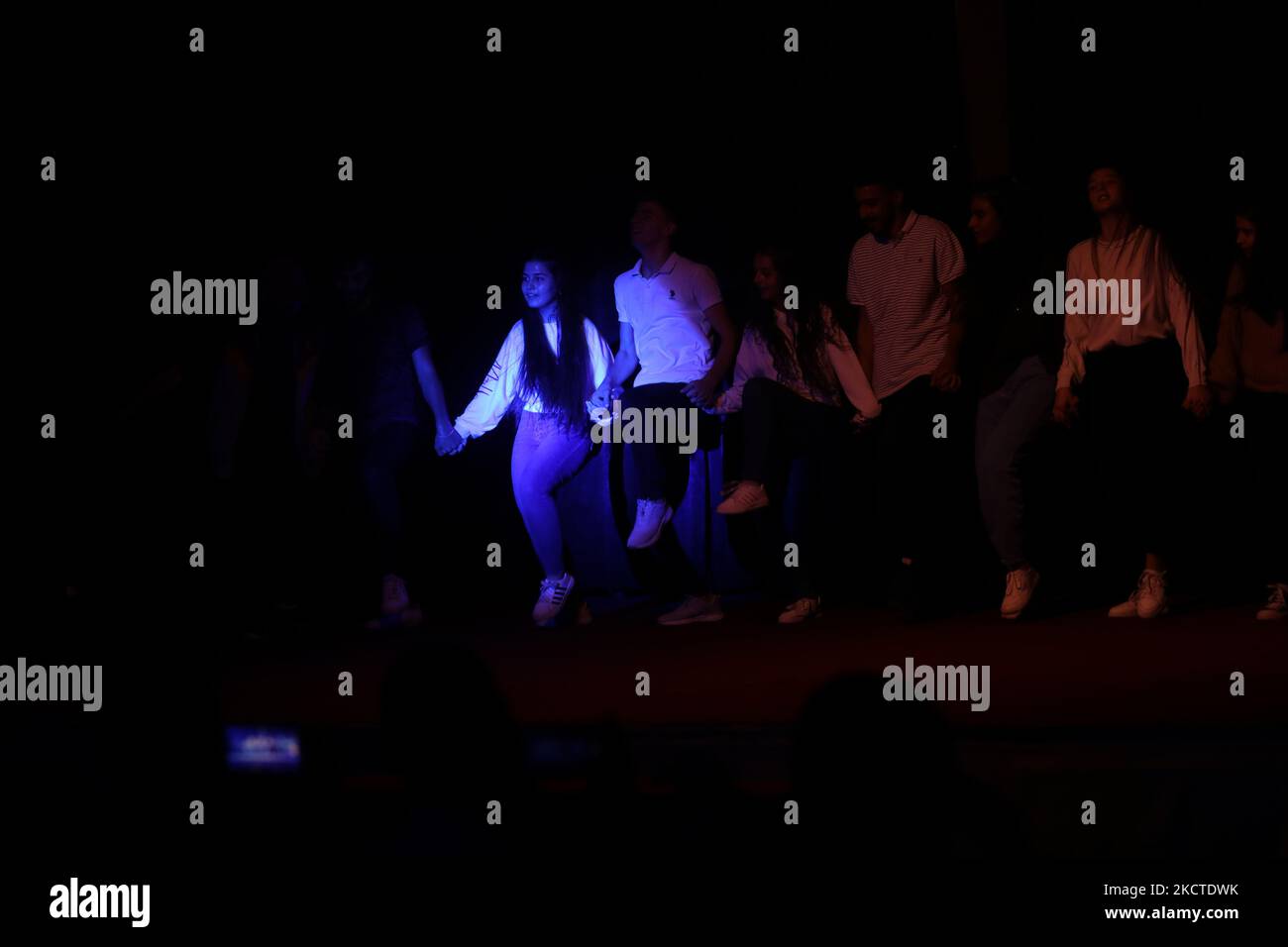 Palestinian youth dance (dabkeh) during an event celebrating ...