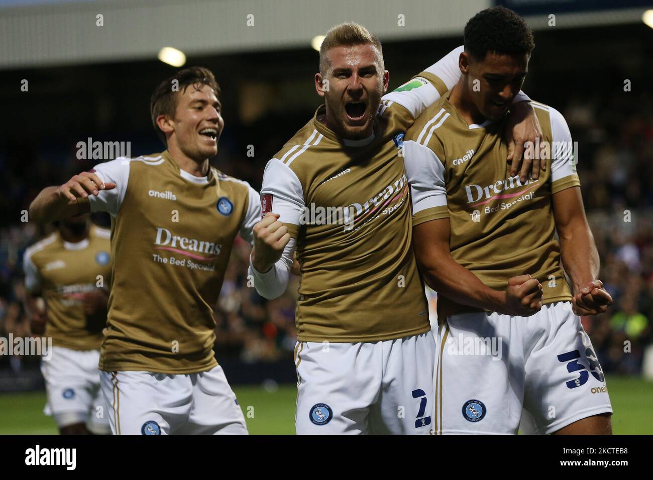 Chris Forino-Joseph of Wycombe Wanderers celebrates with his team mates ...
