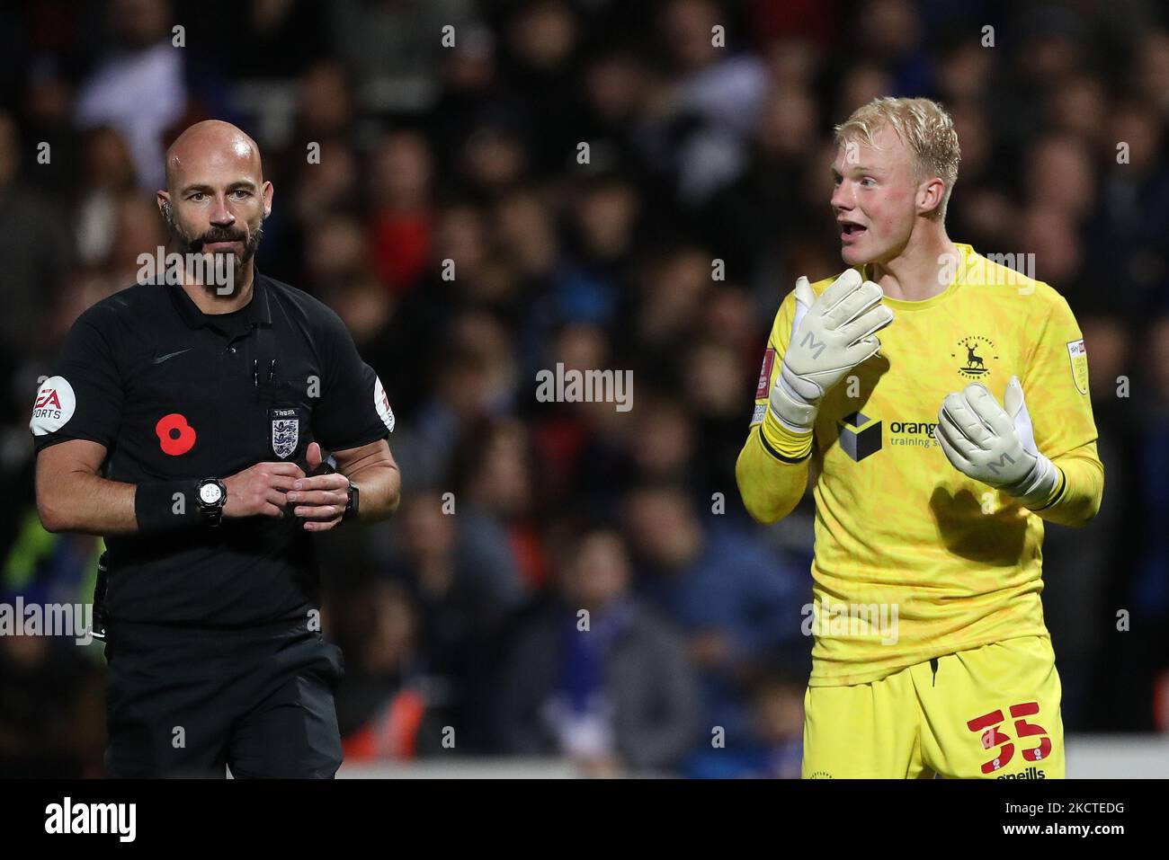 Jonathan Mitchell of Hartlepool United and referee Darren Drysdale ...