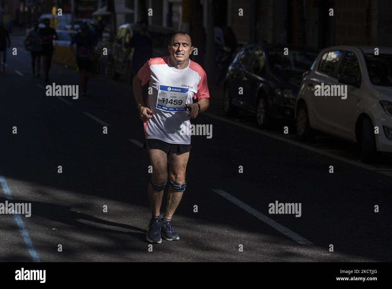 People take part in the Barcelona Marathon, in Barcelona, Spain, on ...