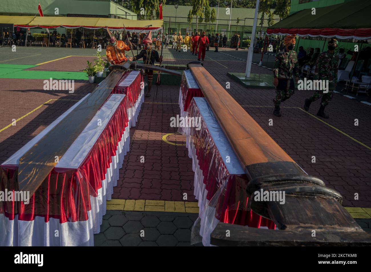 Traditional leaders look at the Guma traditional weapon measuring 7.7 ...