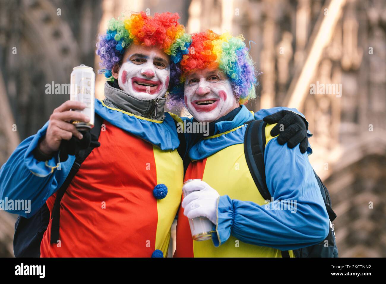 Carnival revellers pose for picture in front of Dom Cathedral during ...