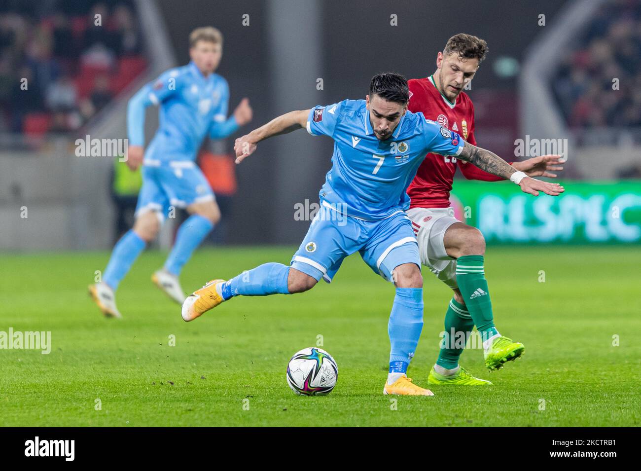 Fabio Tomassini of San Marino competes for the ball with Balint Vécsei ...