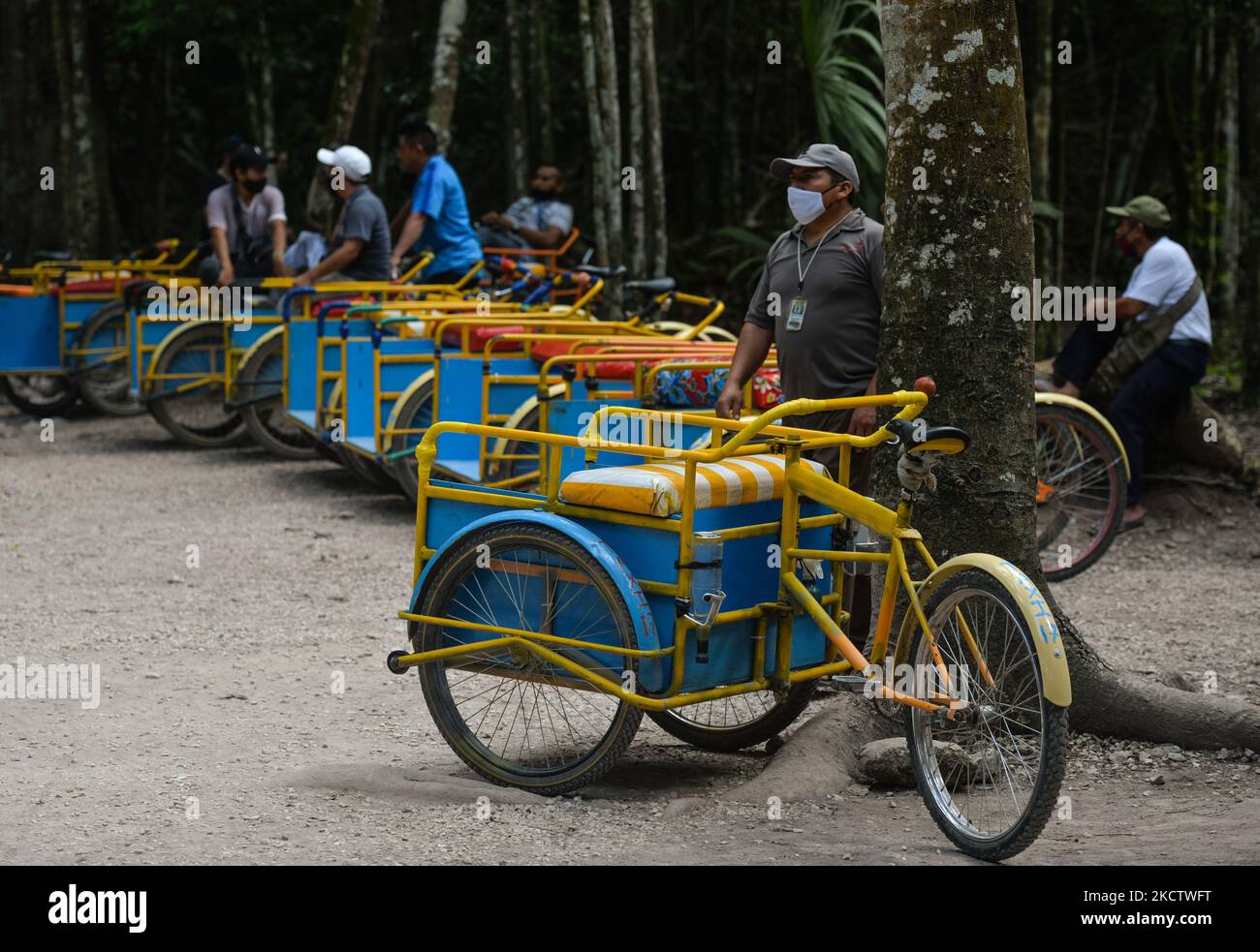 Bicitaxis (tricycle taxis) awaiting for visitors inside the ...