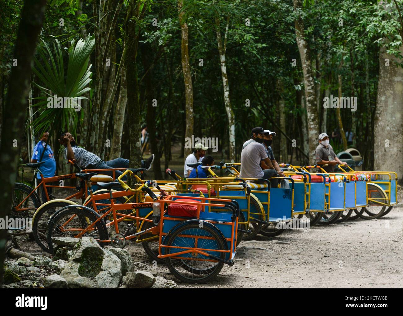 Bicitaxis (tricycle taxis) awaiting for visitors inside the ...