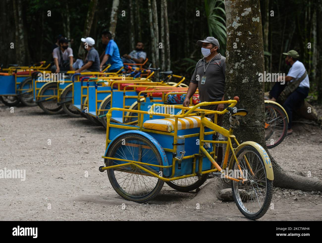 Bicitaxis (tricycle taxis) awaiting for visitors inside the ...