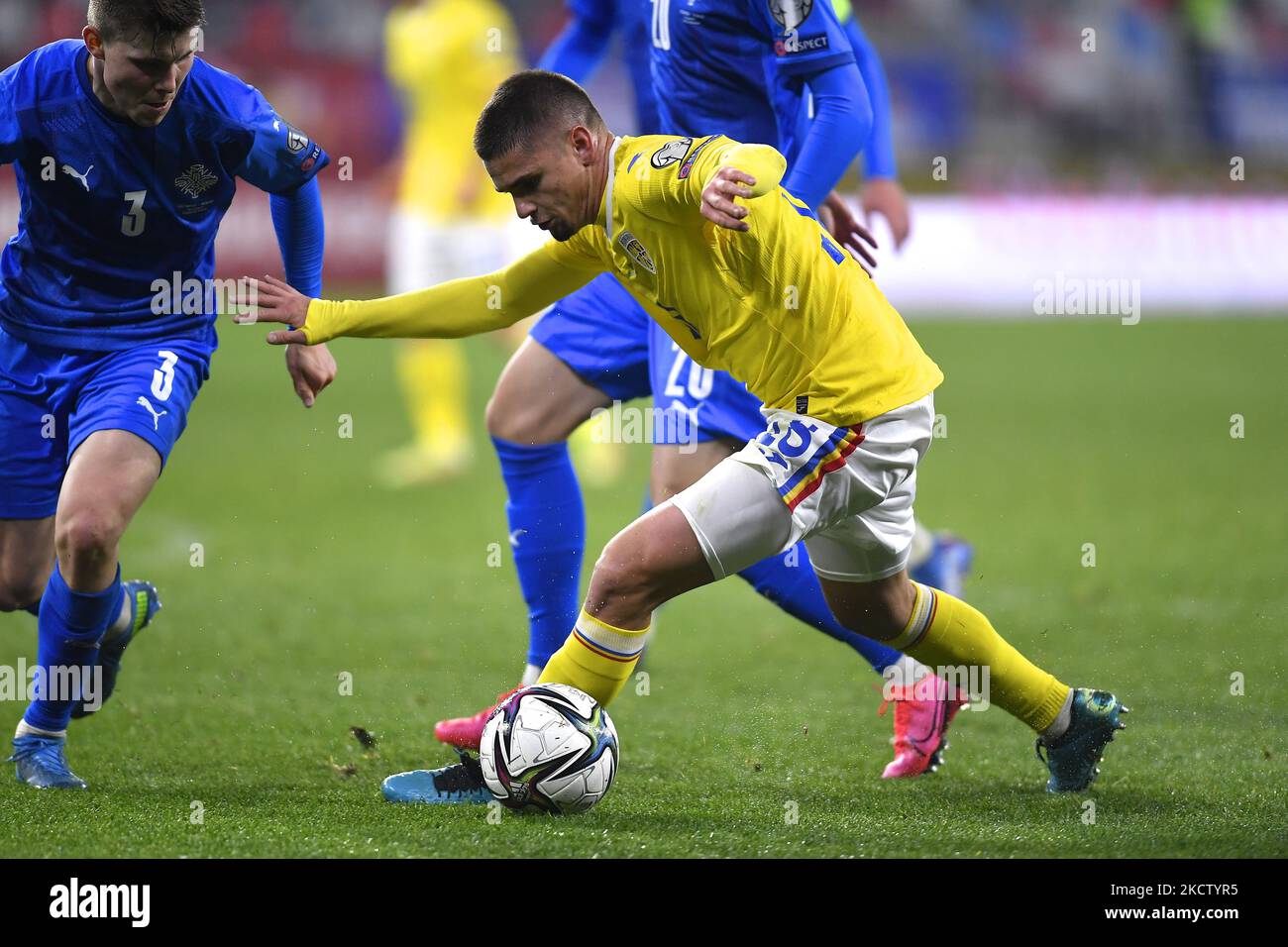 Razvan Marin and Thorir Johann Helgason in action during the FIFA World ...
