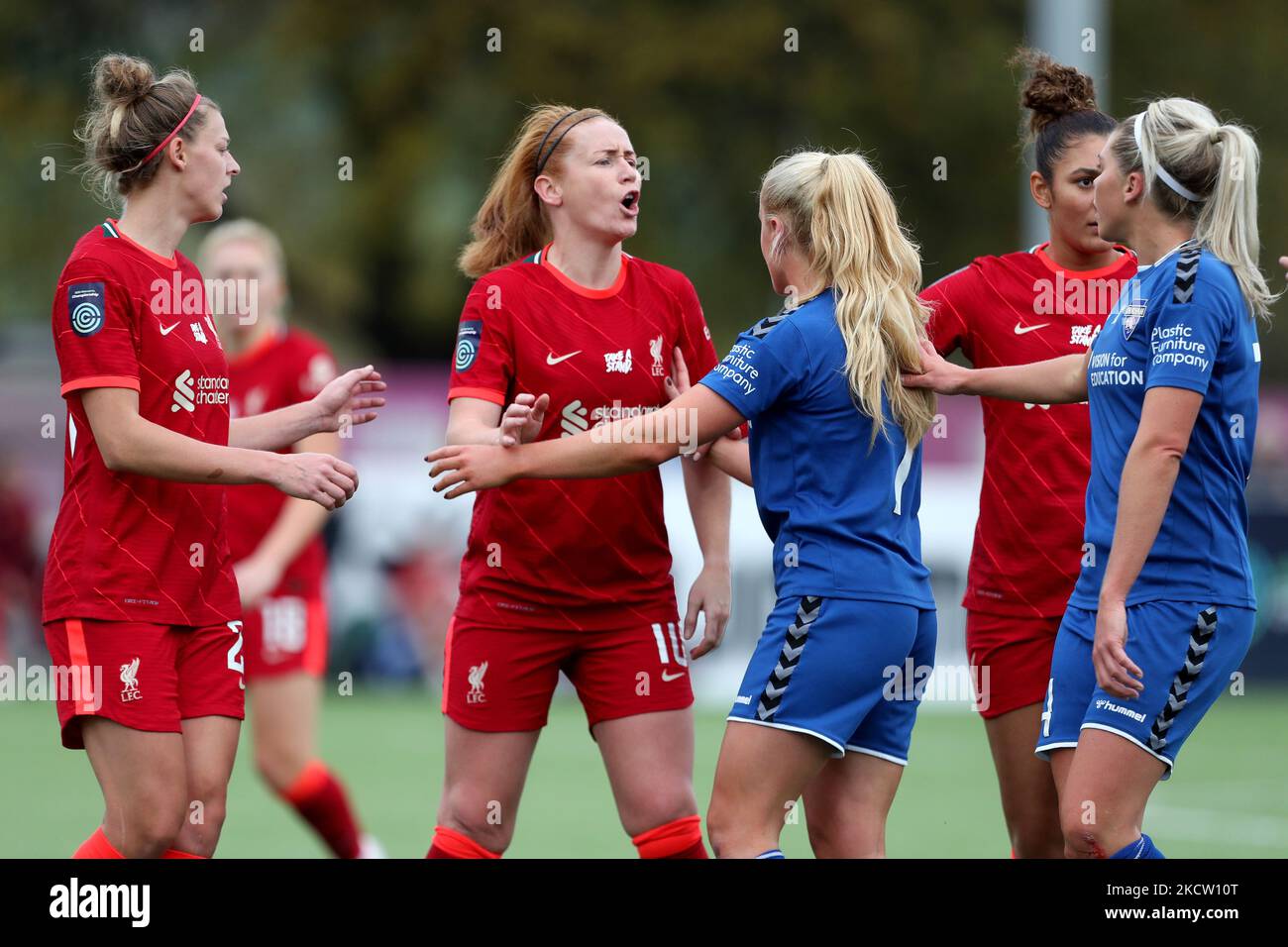 Liverpool's Rachel Furness (c), Yana Daniels and Jade Bailey with ...