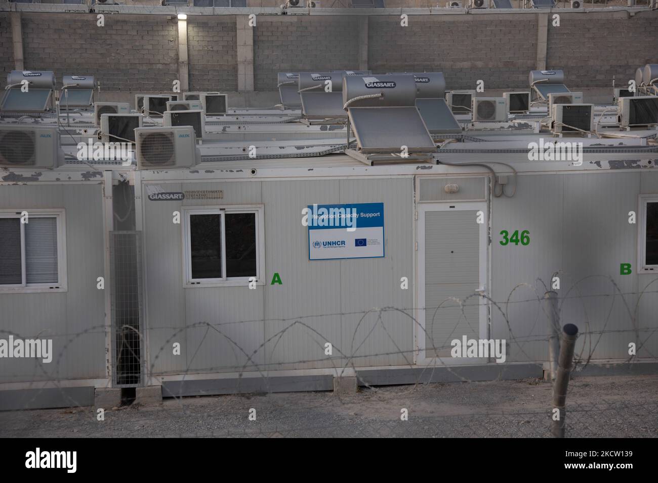 Evening sunset time outside of the barbed wire fence of the new camp ...