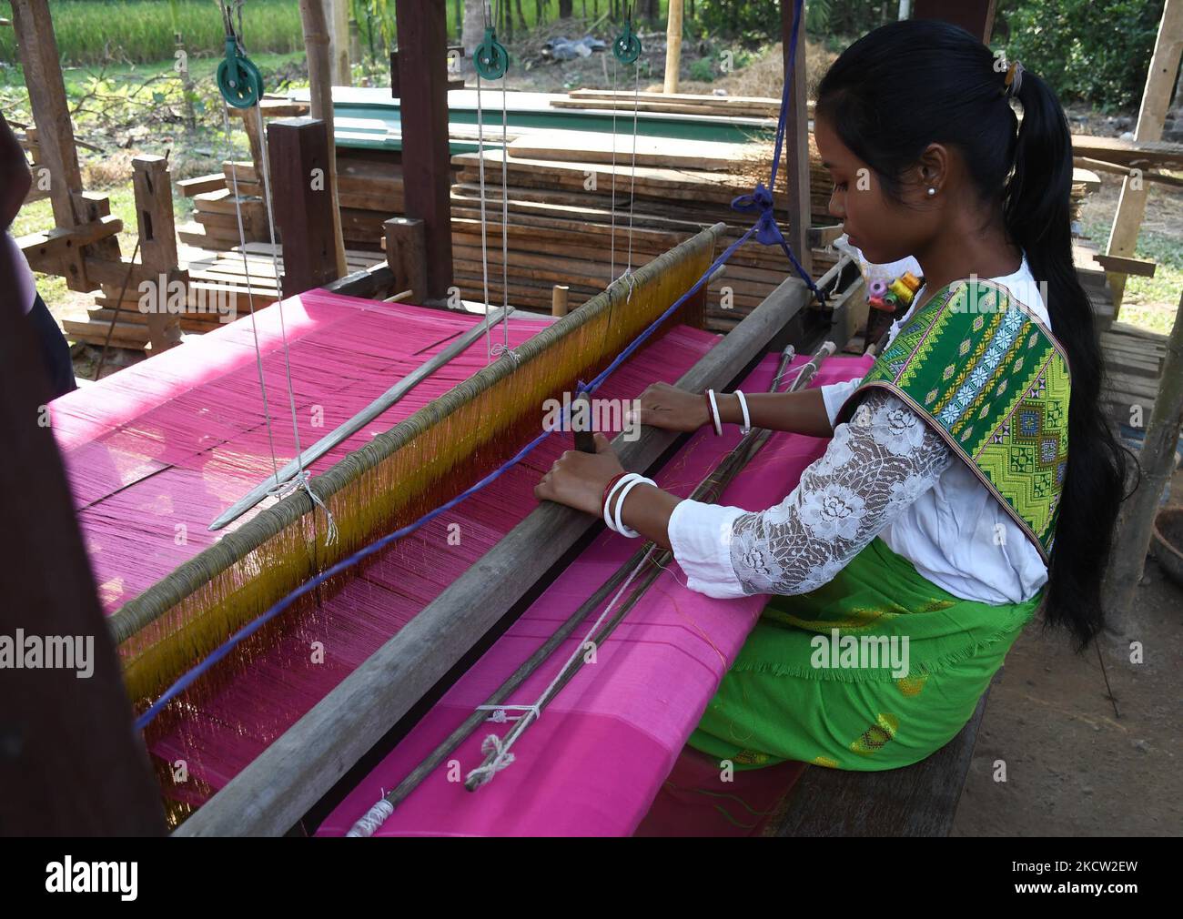 A Women Weaving Bodo Traditional Dress Dokhona In Kokrajhar District In The Northeastern State