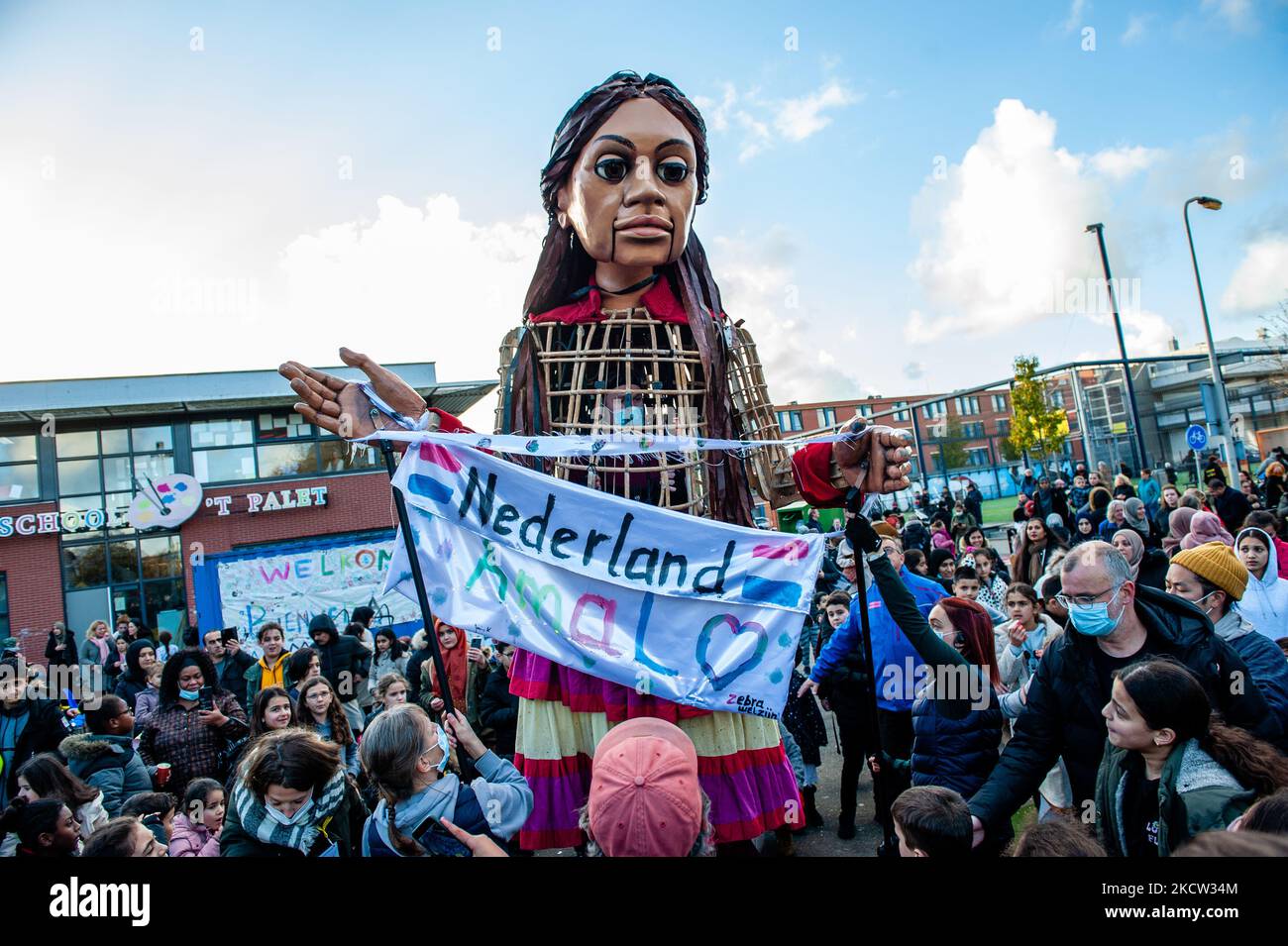 The giant puppet 'Little Amal', a nine-year-old Syrian refugee girl and ...