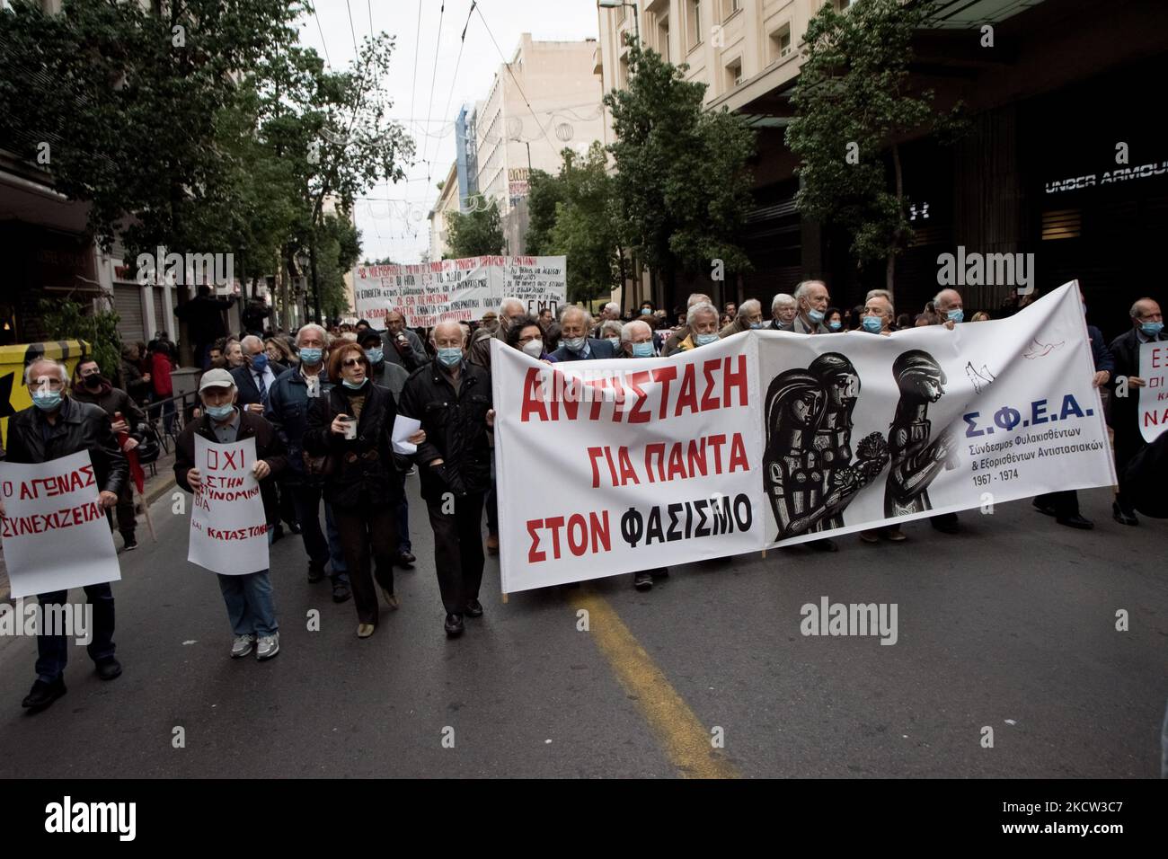 People march during a demonstration marking 48th anniversary of 1973 ...