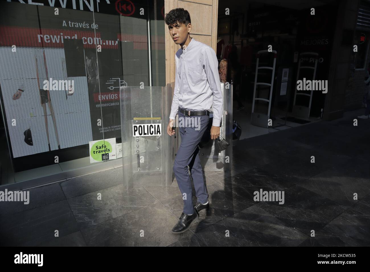 A passerby in the streets of Mexico City during the COVID-19 health ...