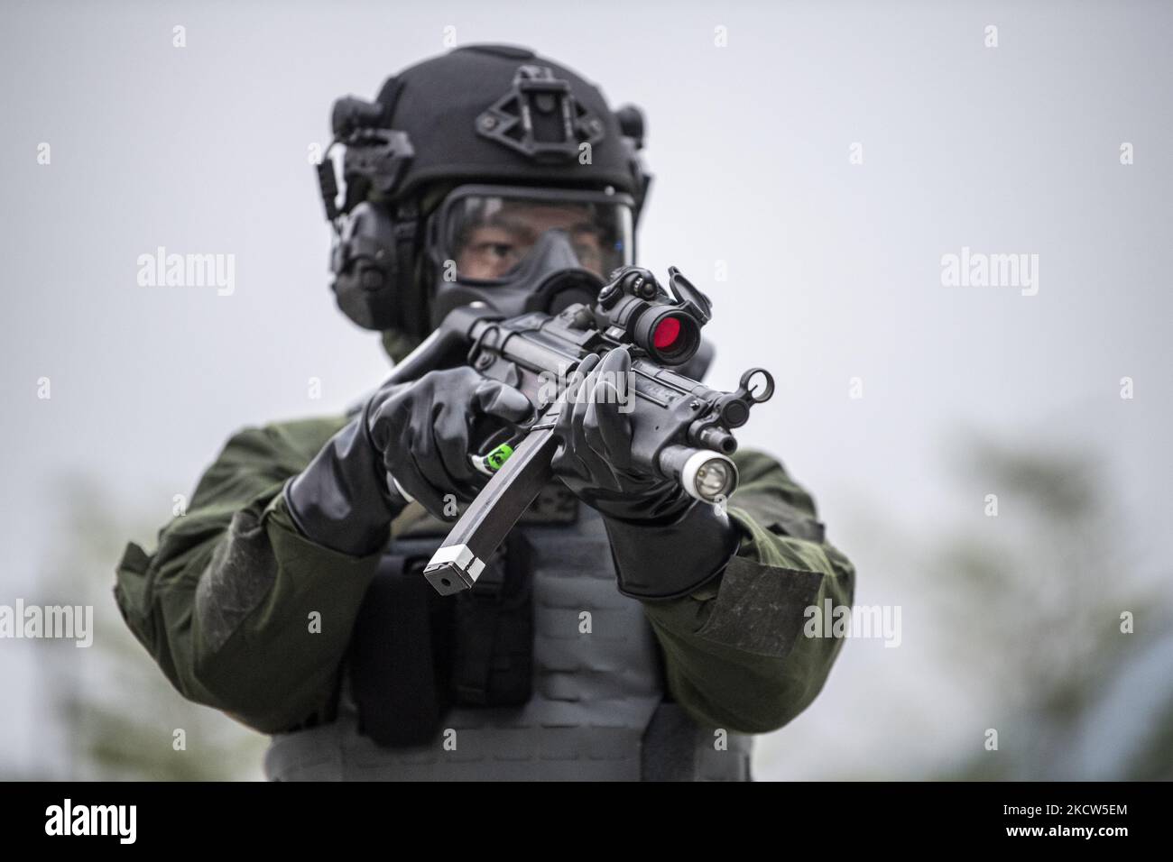 A Counter Terrorism unit Police Officers holding his Weapon during a ...