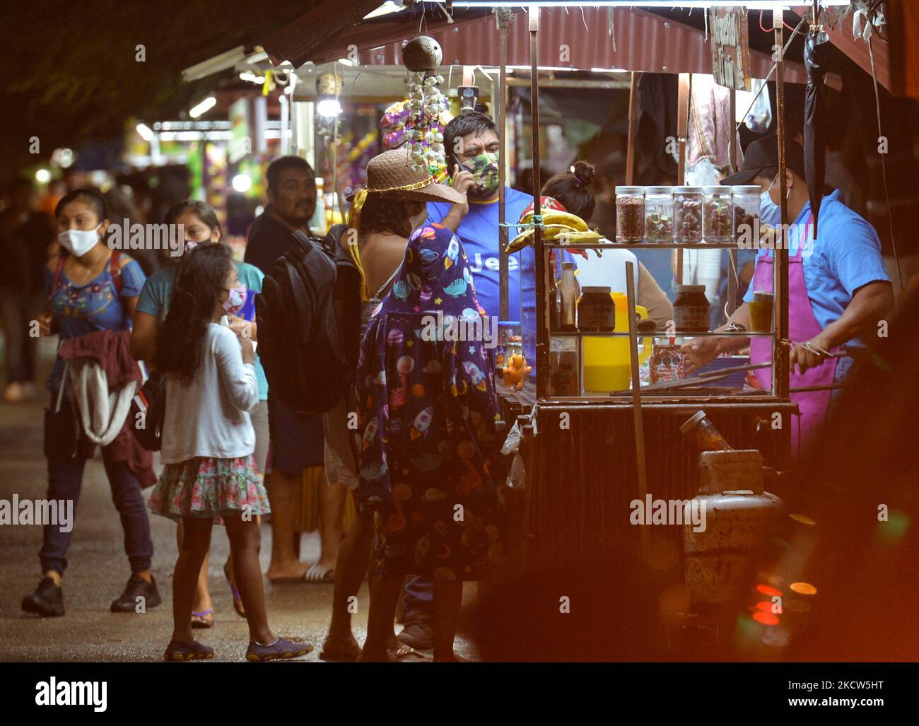 Street stands selling traditional food in the center of Tulum. On ...