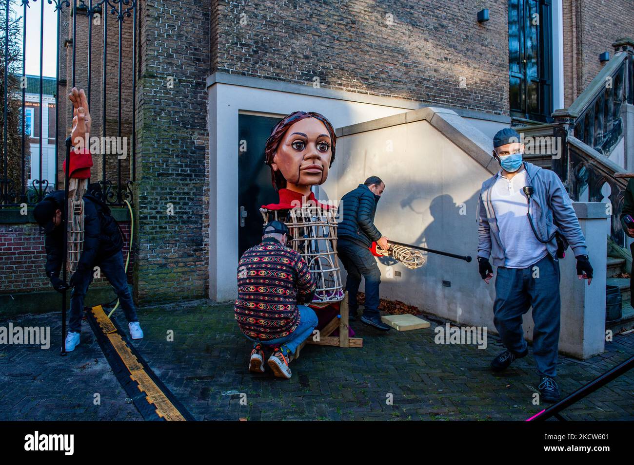 A view of the giant puppet Little Amal disassembled and ready to put on a track after her visit ...