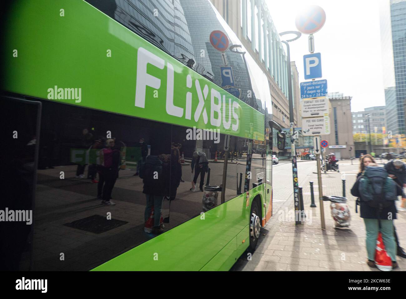 A green bus of FlixBus with the inscription and the brand logo on the ...