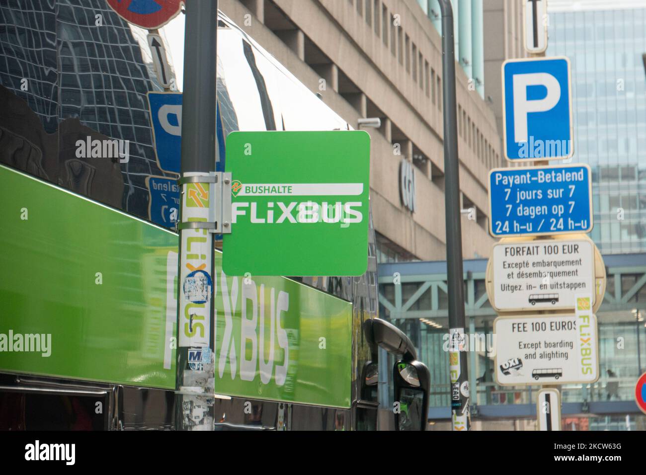 Flixbus bus stop sign. A green bus of FlixBus with the inscription and ...