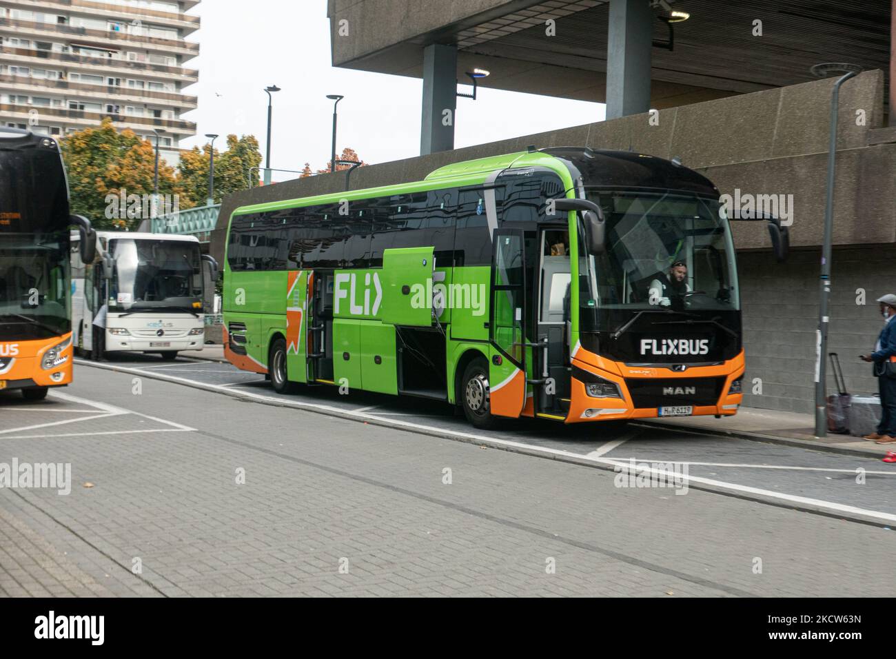 A green bus of FlixBus with the inscription and the brand logo on the ...