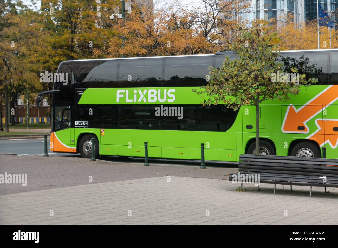 A green bus of FlixBus with the inscription and the brand logo on the ...
