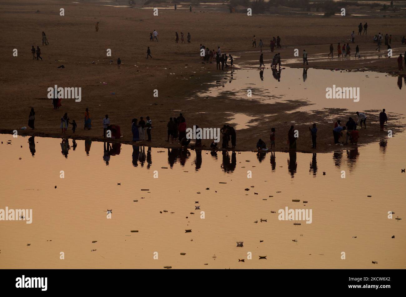 Devotees are seen on the bank of Daya river as they sail fancy boats ...