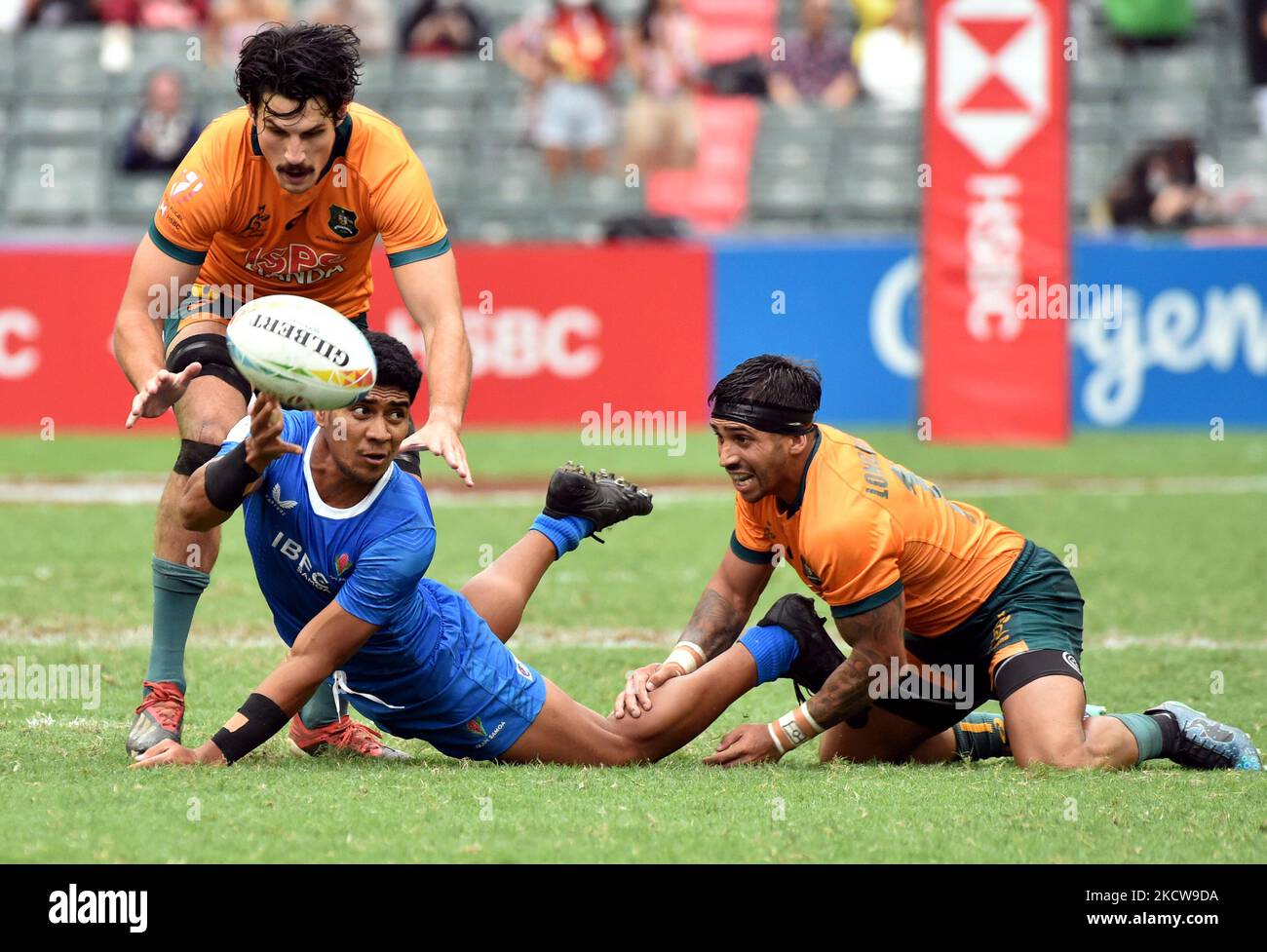 Hong Kong, China. 5th Nov, 2022. Paul Scanlan (bottom) of Samoa passes ...