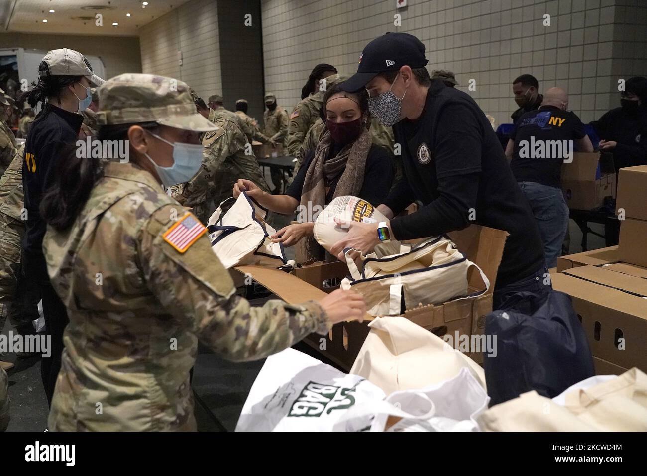 Us military personnel load boxes hi-res stock photography and images ...