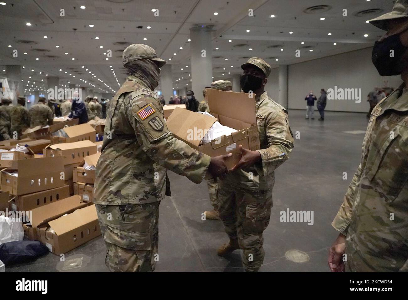 Us military personnel load boxes hi-res stock photography and images ...