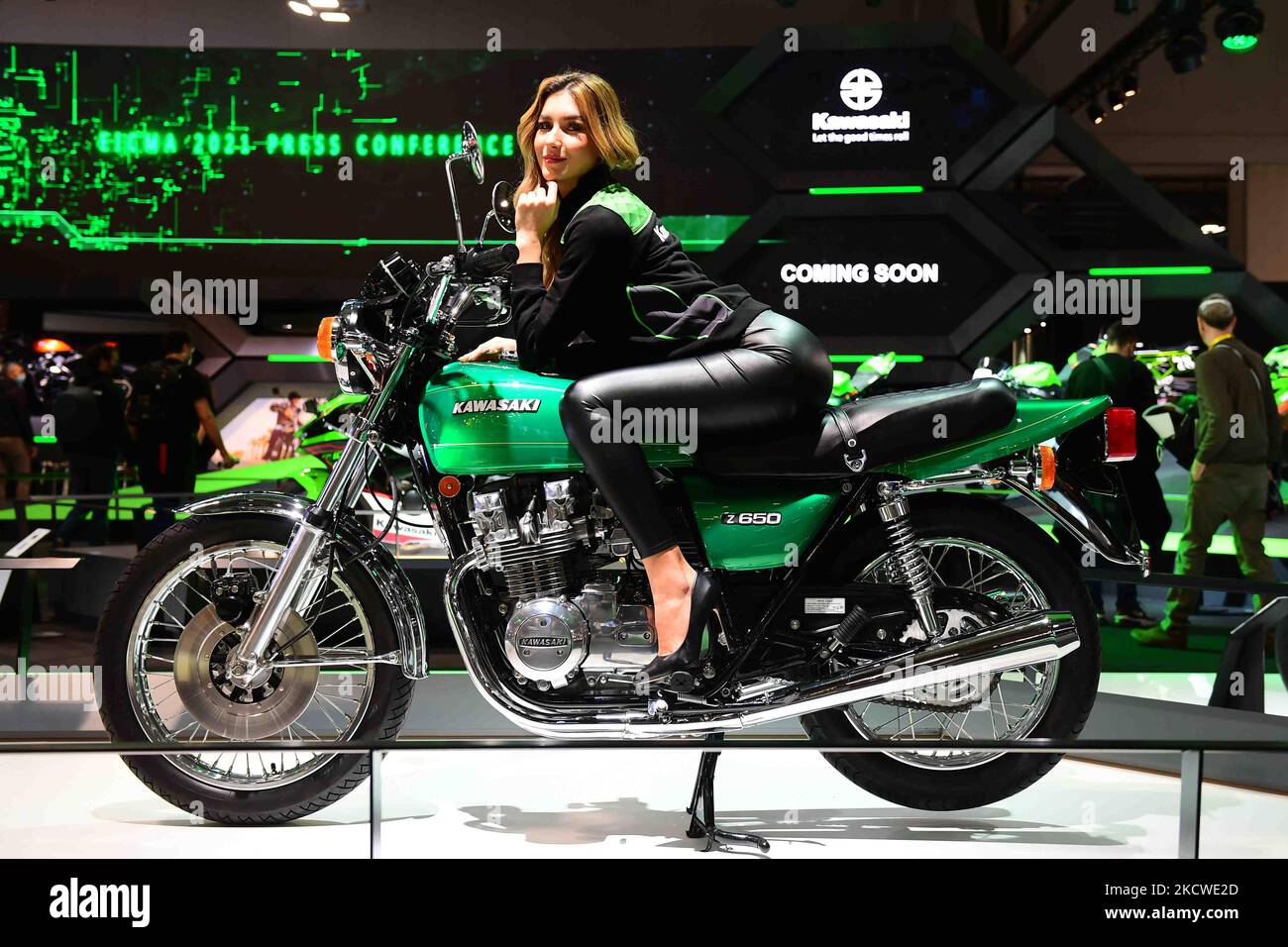 The models pose during EICMA, the international trade fair dedicated to ...
