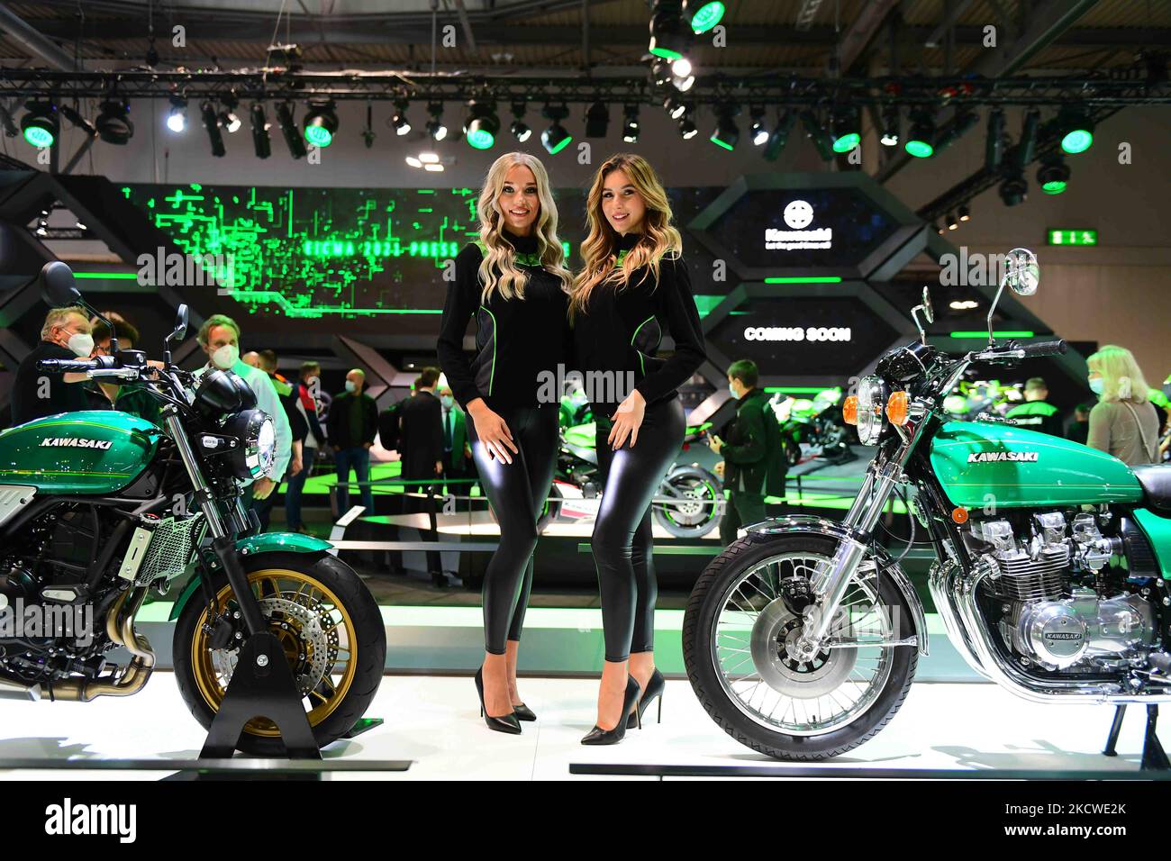 The models pose during EICMA, the international trade fair dedicated to ...