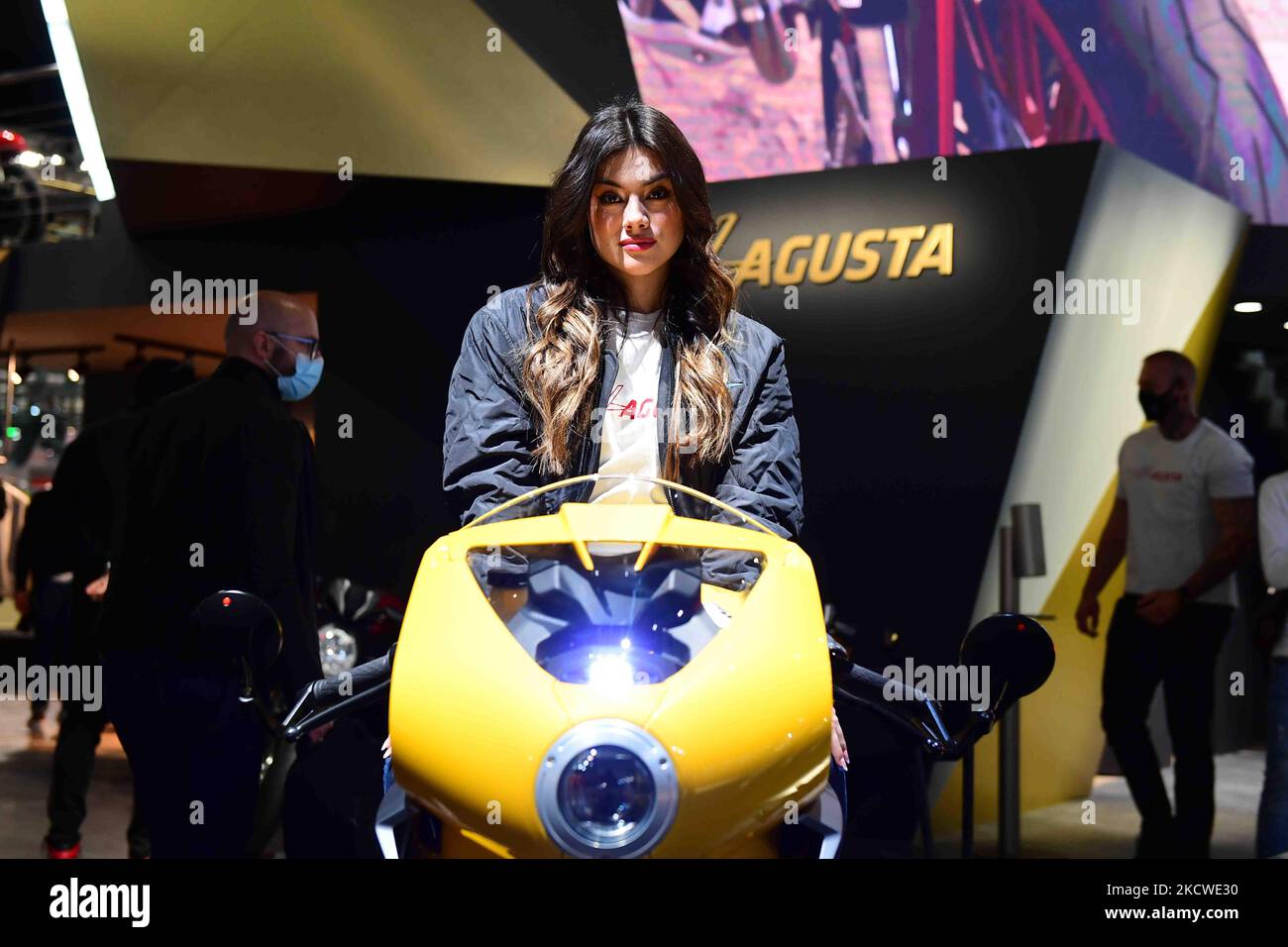 The models pose during EICMA, the international trade fair dedicated to ...