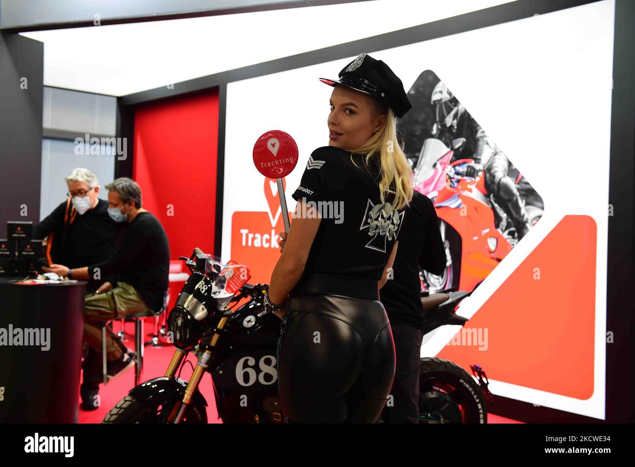 The models pose during EICMA, the international trade fair dedicated to ...