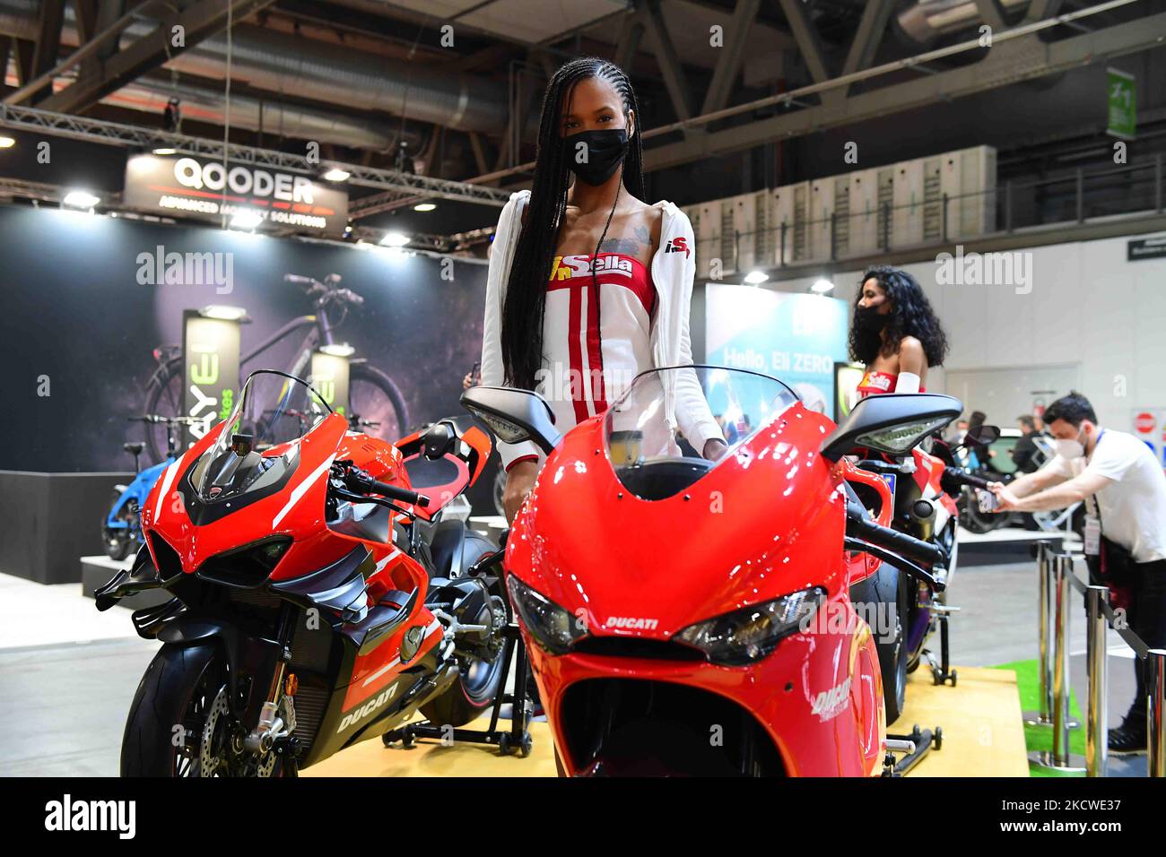 The models pose during EICMA, the international trade fair dedicated to ...