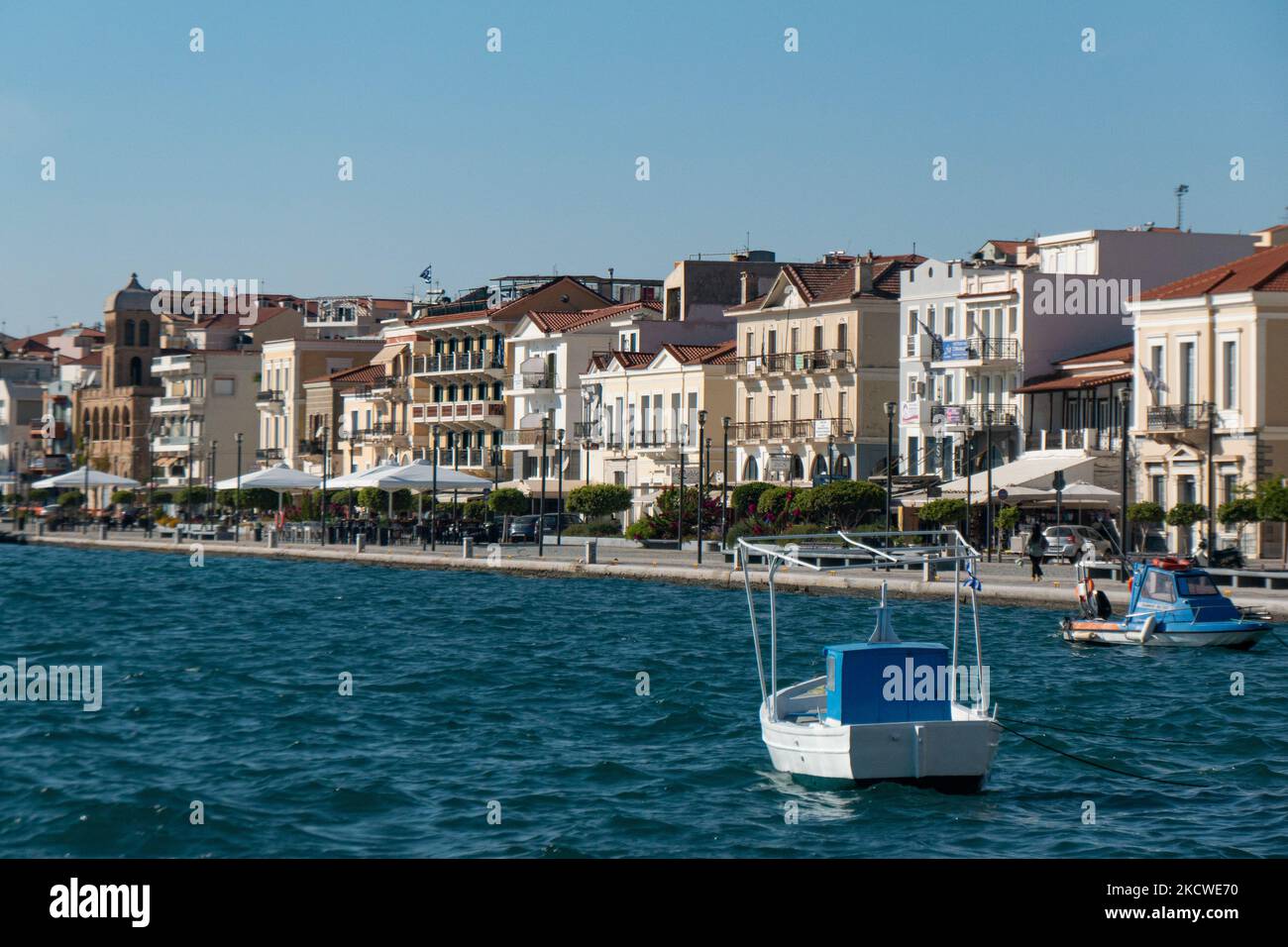 Beautiful traditional wooden fishing boats docked at the harbor of ...