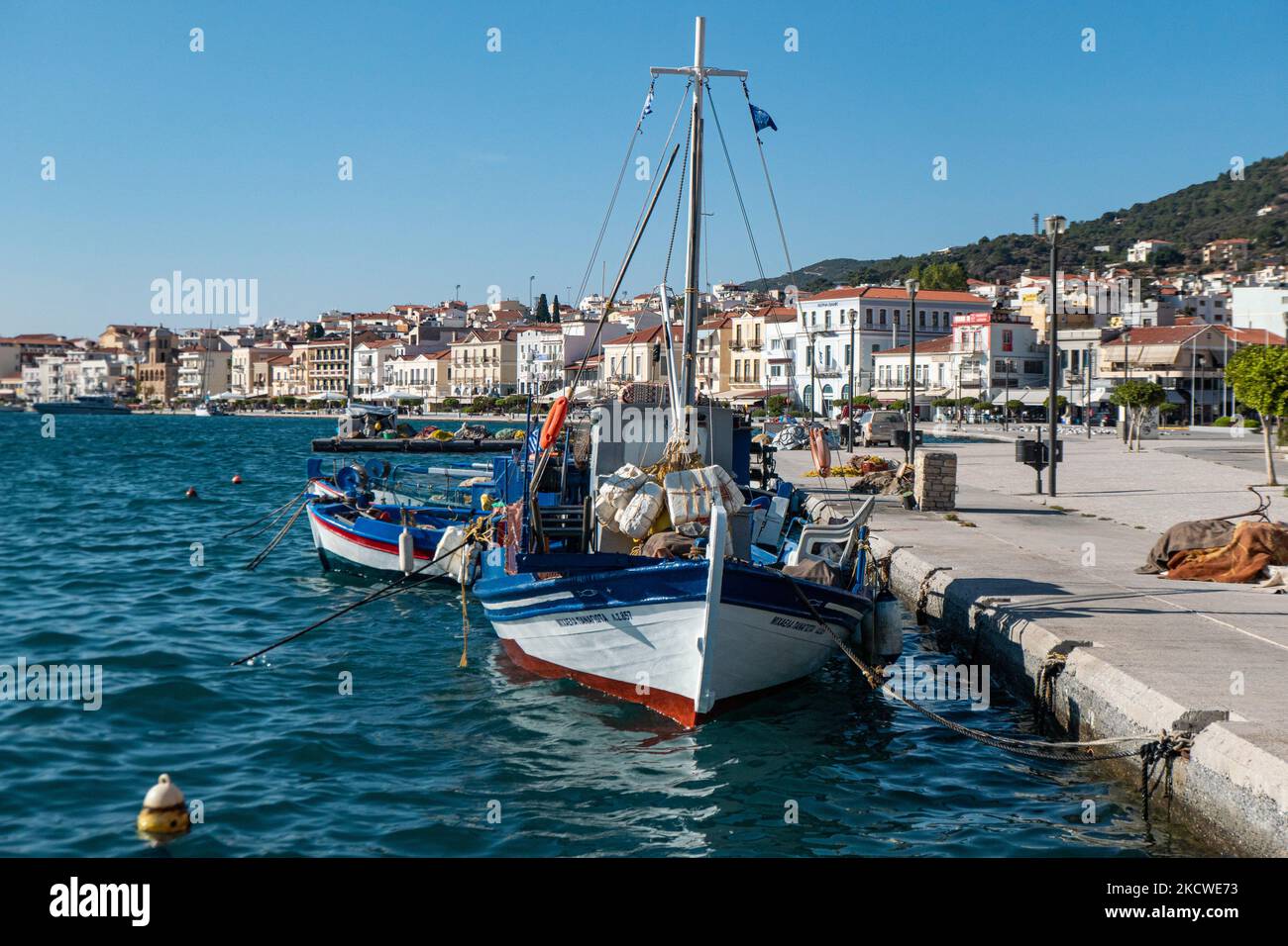 Beautiful traditional wooden fishing boats docked at the harbor of ...