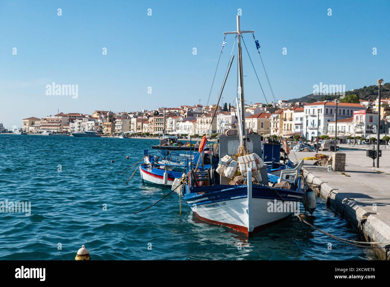 Beautiful traditional wooden fishing boats docked at the harbor of ...