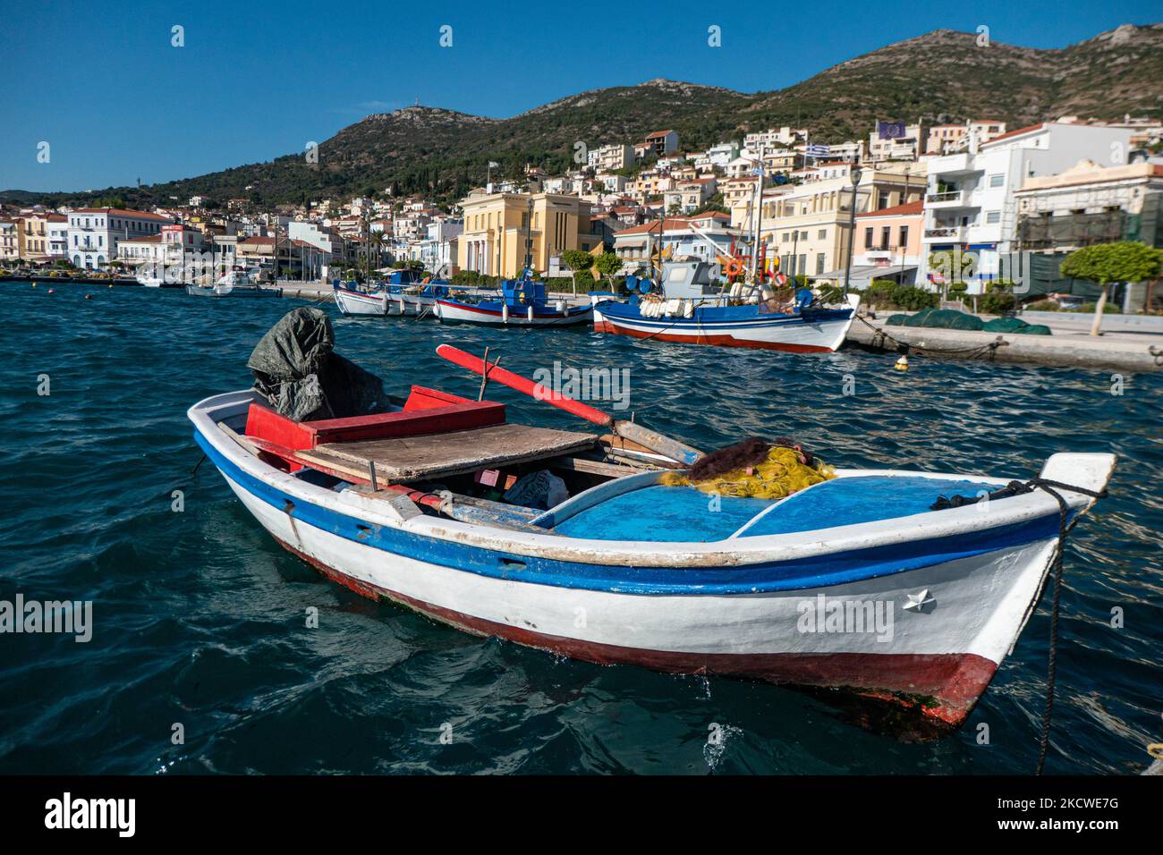 Beautiful traditional wooden fishing boats docked at the harbor of ...